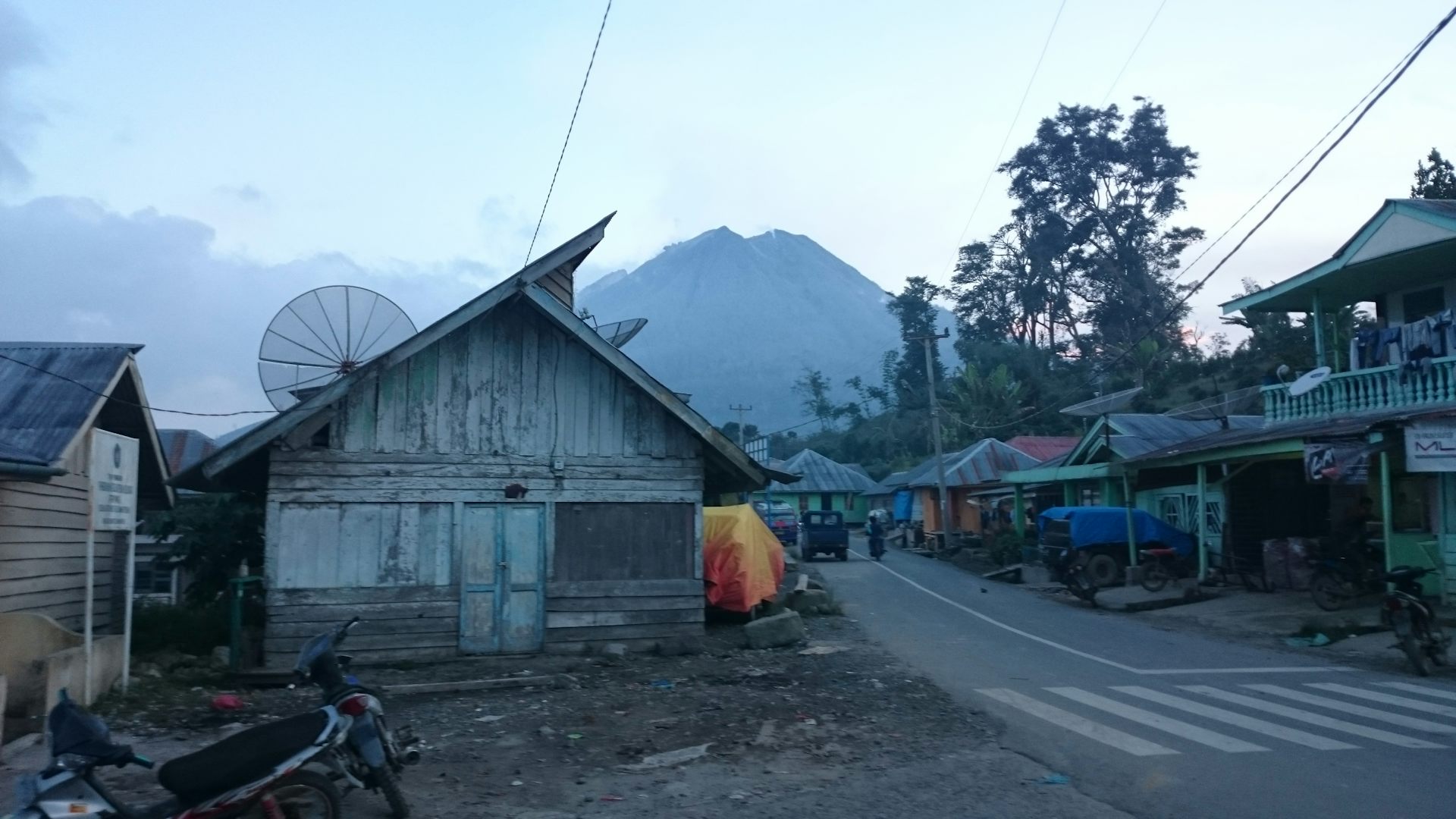 Why do people still live next to an active volcano?