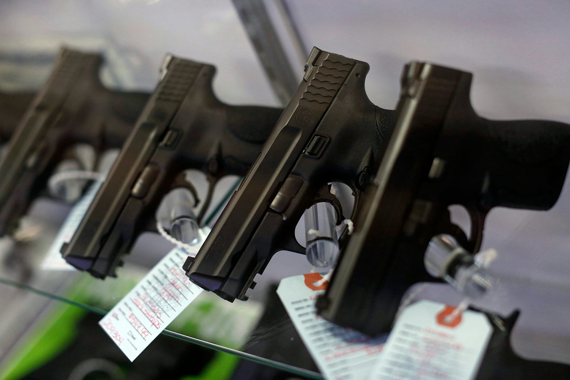 Quantifying the social cost of firearms: a new approach to gun control