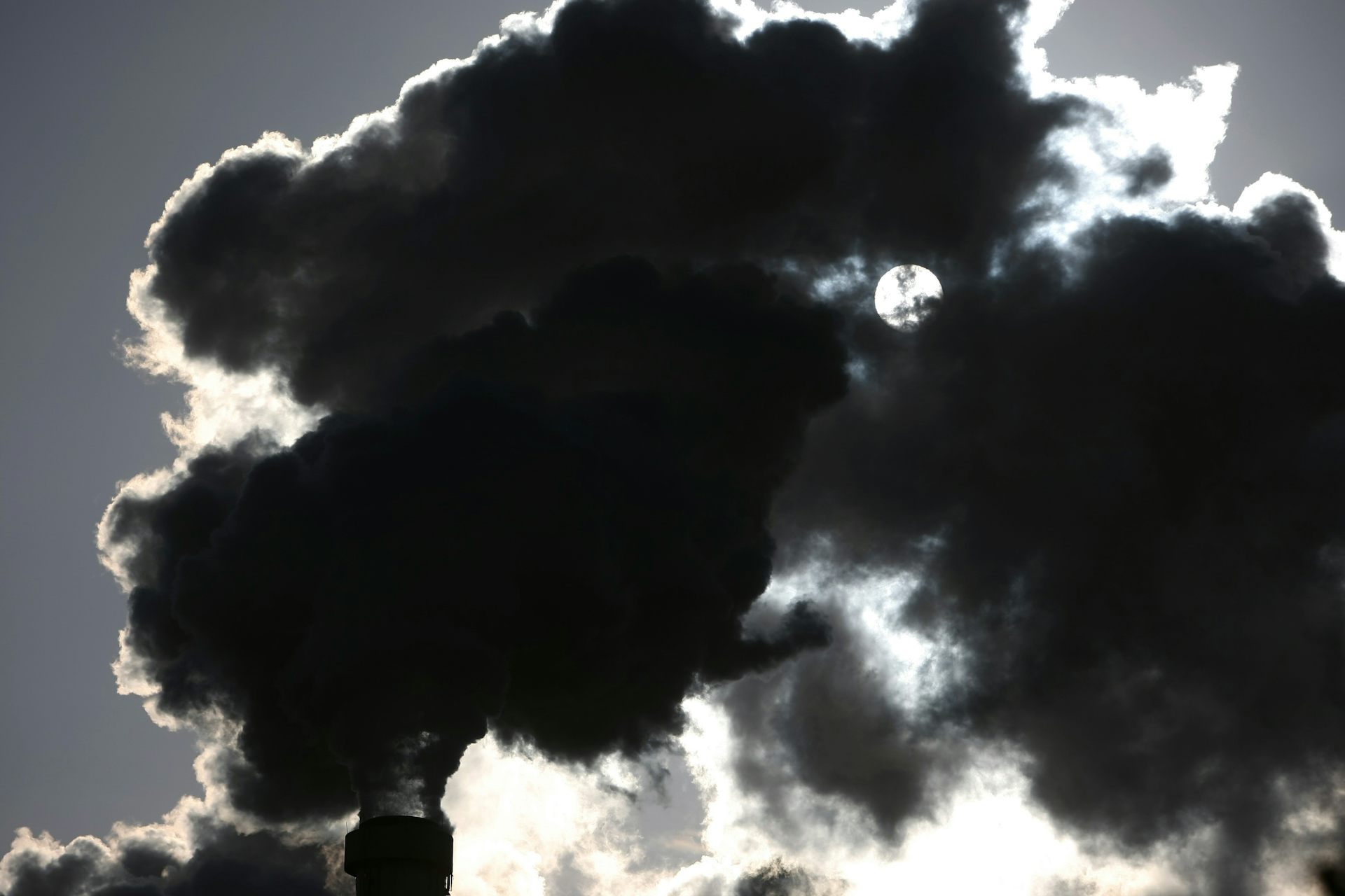Explainer: The difference between a carbon tax and an ETS