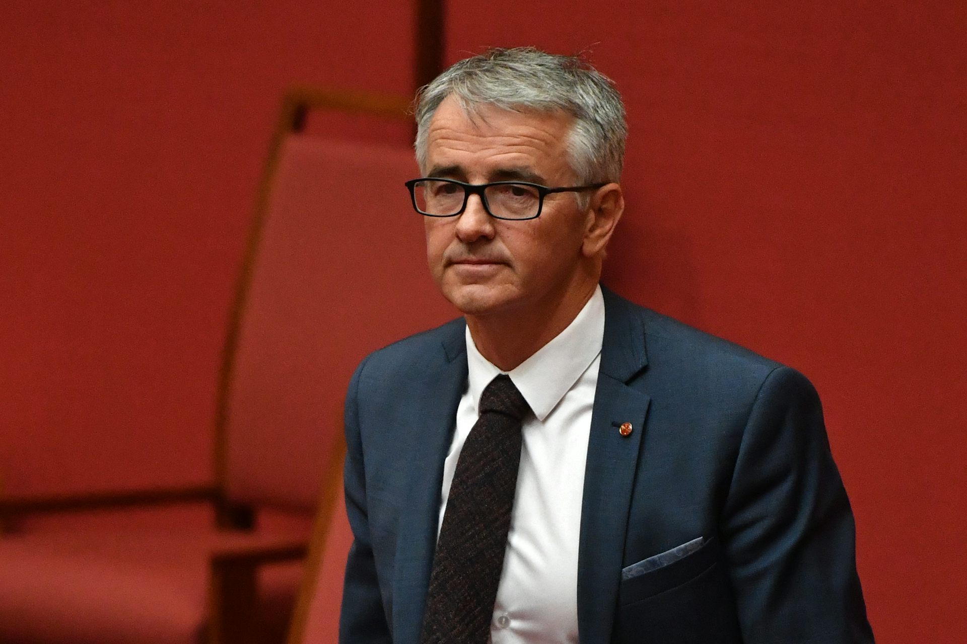 Queensland rebel Liberal senator says he’ll withhold vote over COVID issues