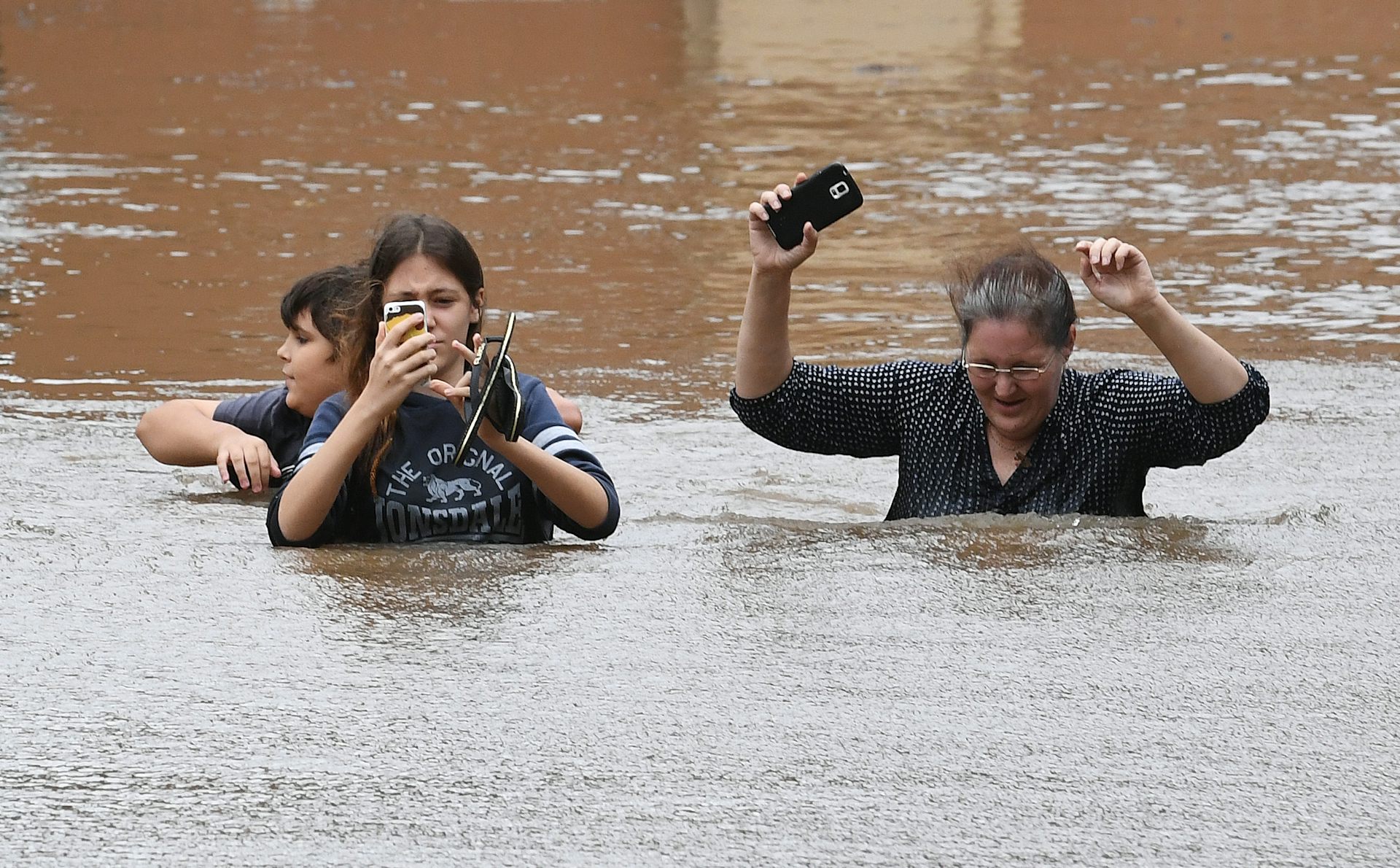 After years of COVID, fires and floods, kids’ well-being now depends on ...