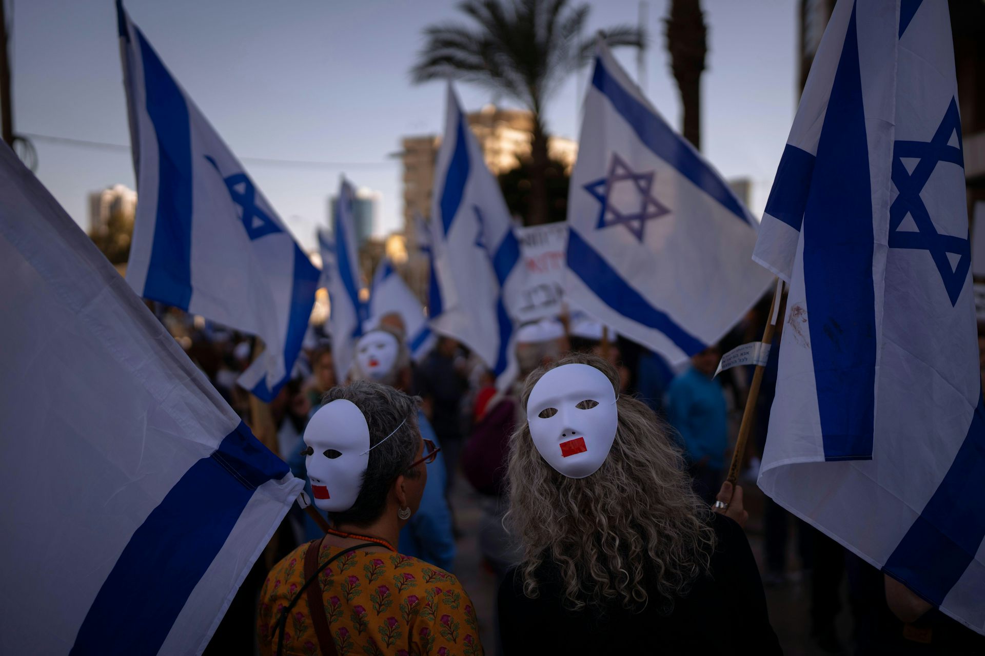 Israel protests: Netanyahu delays judicial reforms over fears of ‘civil ...