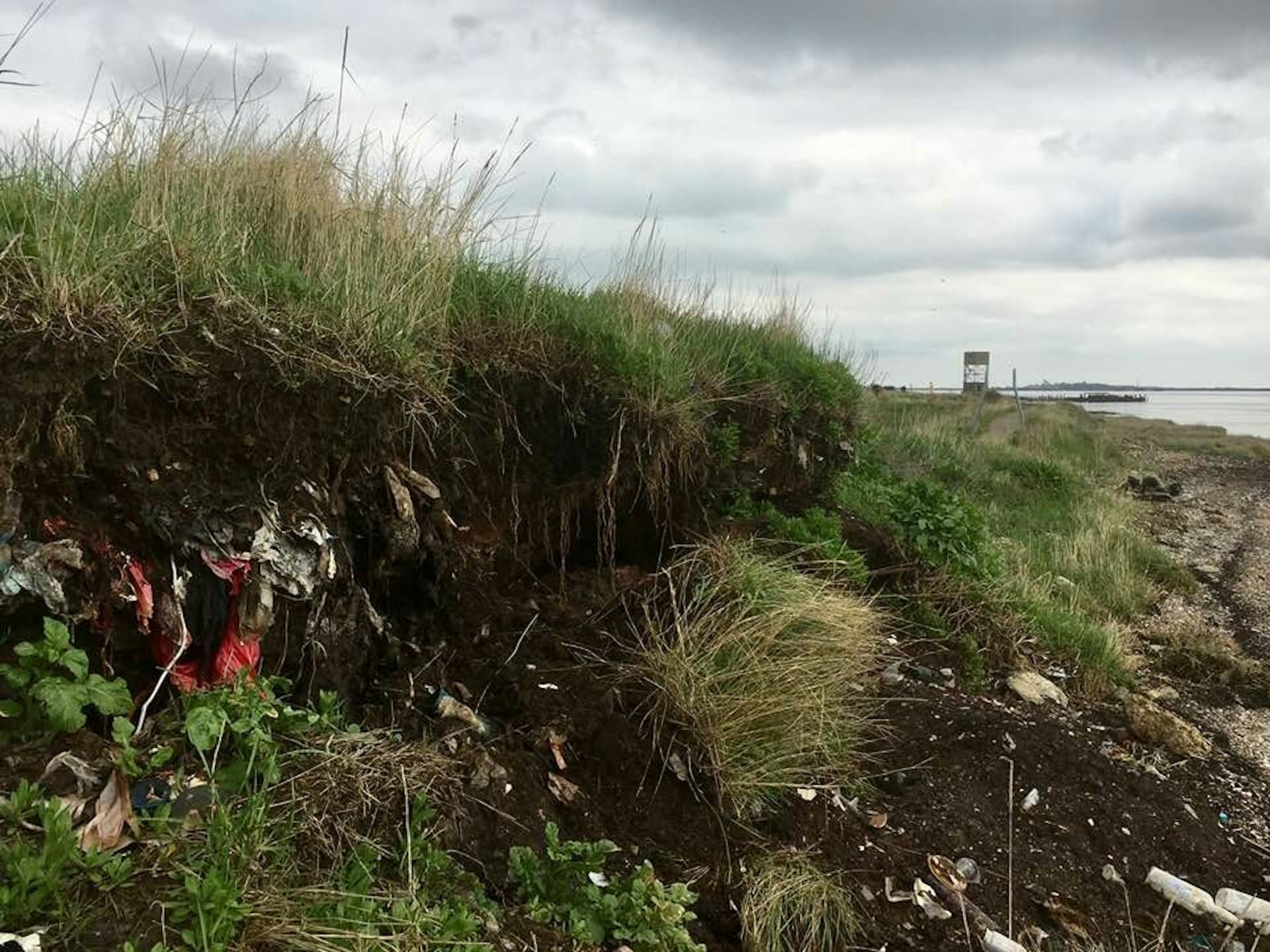 As floodwaters rise, toxic contaminants released from old landfills ...