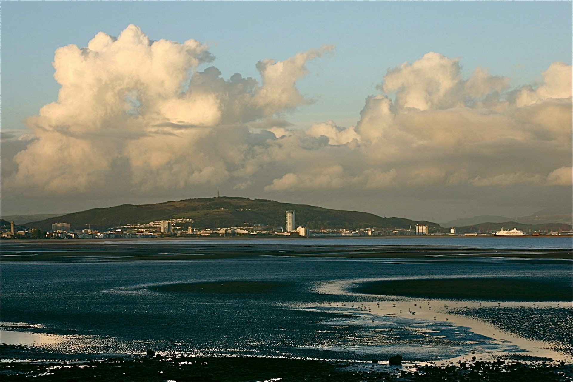 How artificial lagoons can be used to harvest energy from the tides