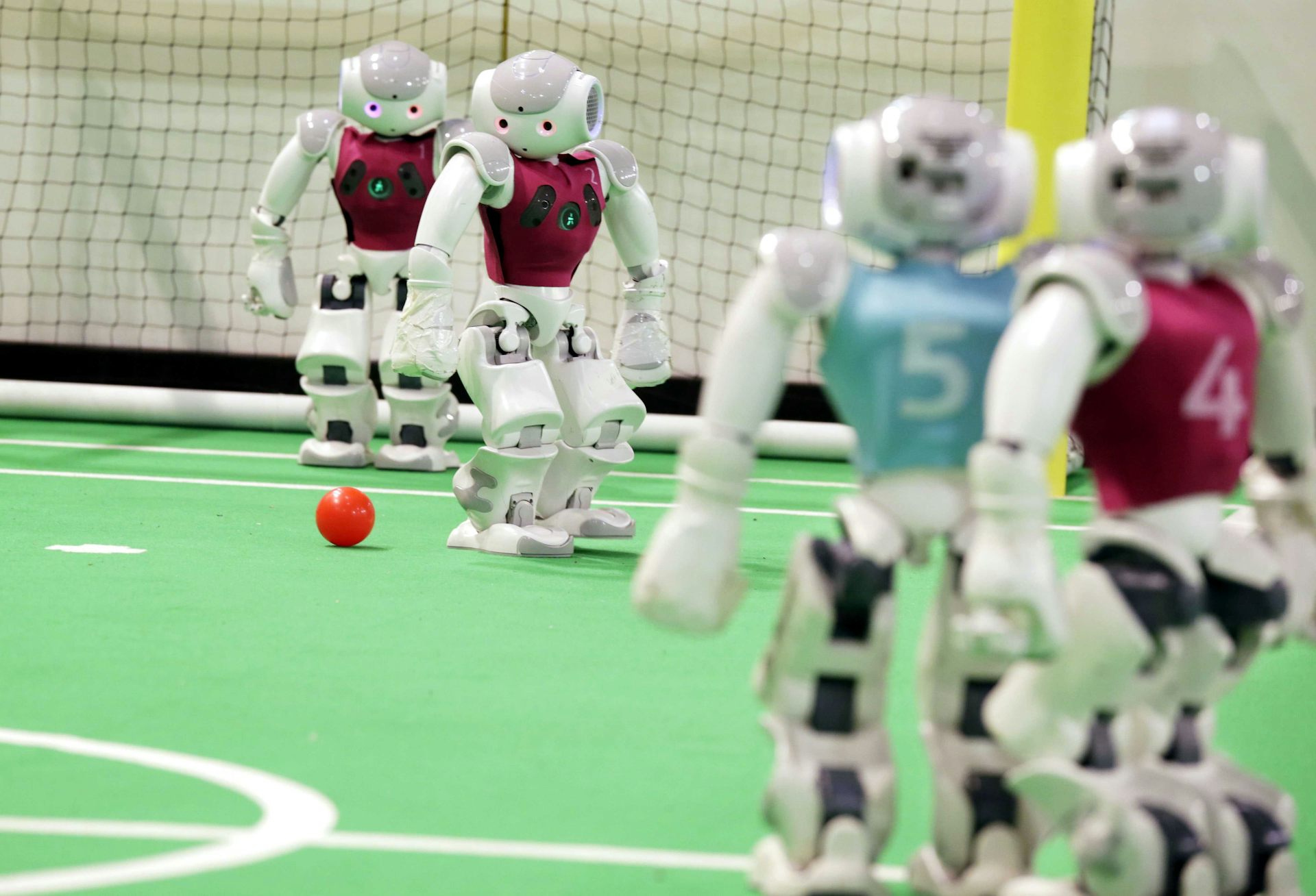 Footballing androids of RoboCup are vital players in our robotic future