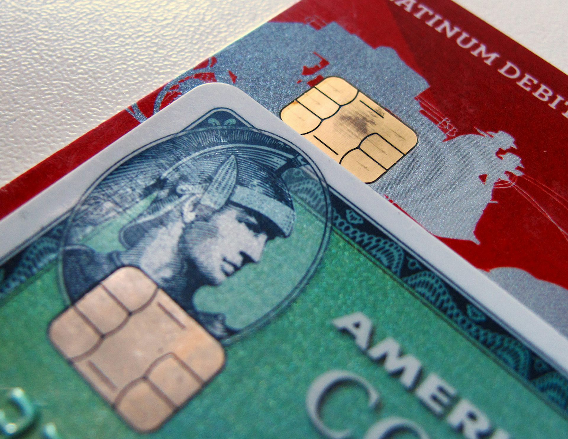 Chip-enabled cards may curb fraud, but consumers will be picking up the tab